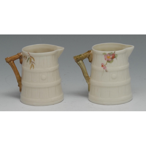 A Royal Worcester coopered barrel shaped jug, painted by W Powell ...