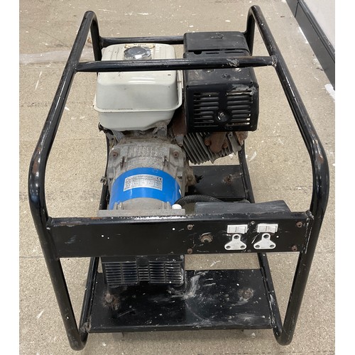 A Honda GX 390 petrol Generator.