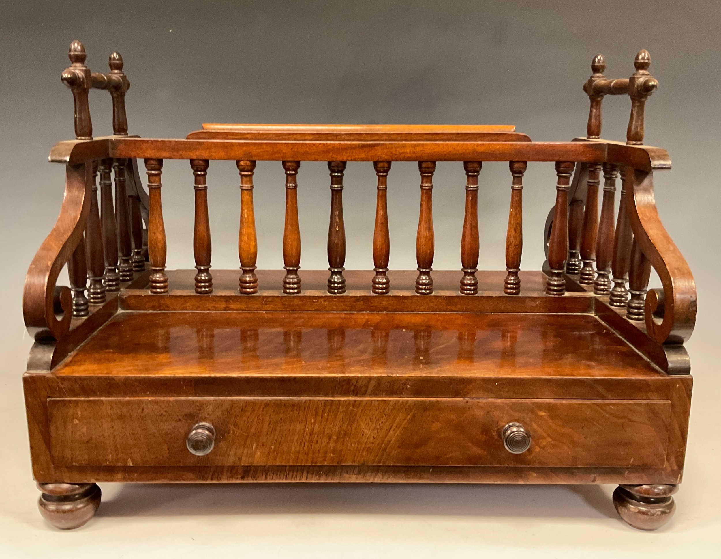 A post-Regency mahogany library book carrier, the double-sided trough ...