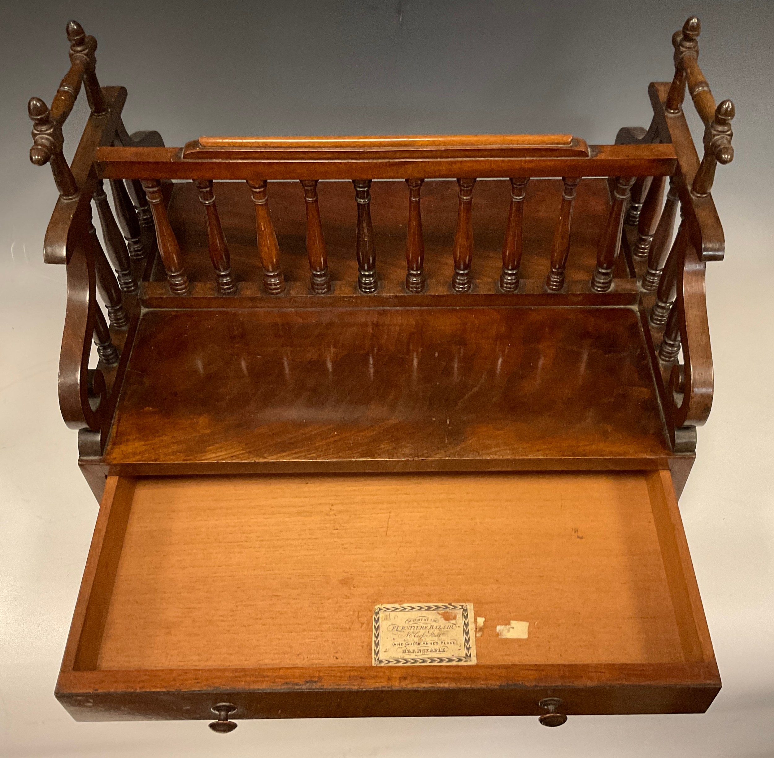 A post-Regency mahogany library book carrier, the double-sided trough ...
