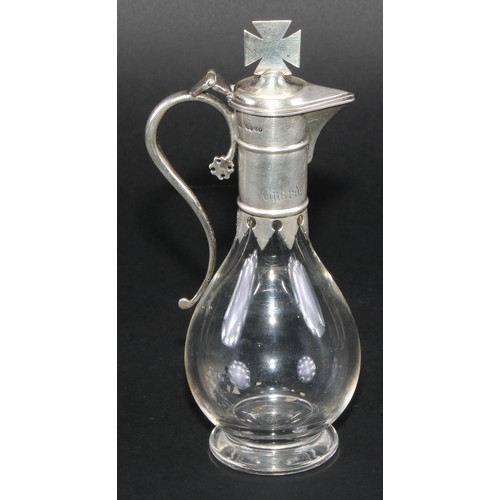 A Victorian Gothic Revival silver mounted clear glass ovoid Communion ...