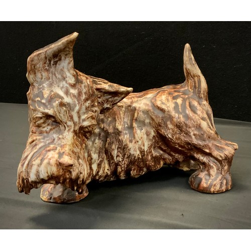 A large earthenware model of a standing Terrier dog, probably by Alice ...