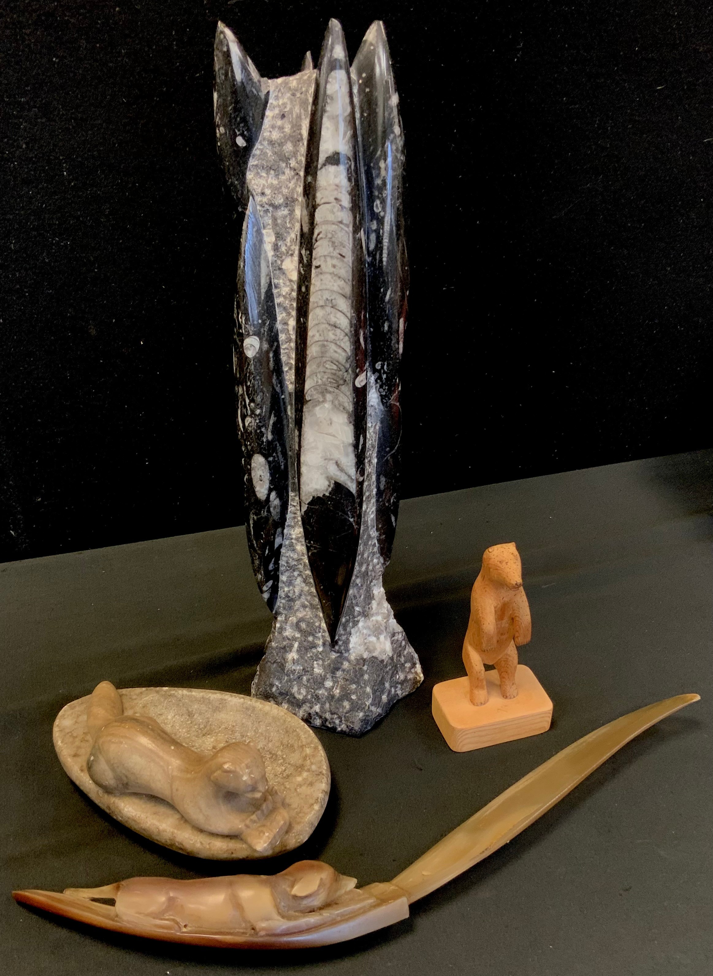 A 20th century Inuit wood carving by Roy Pamialok, as a bear standing ...