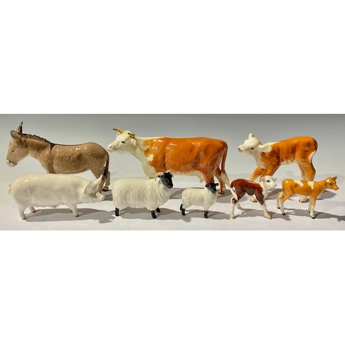 A collection of Beswick farm animals, comprising donkey, cow, sheep ...