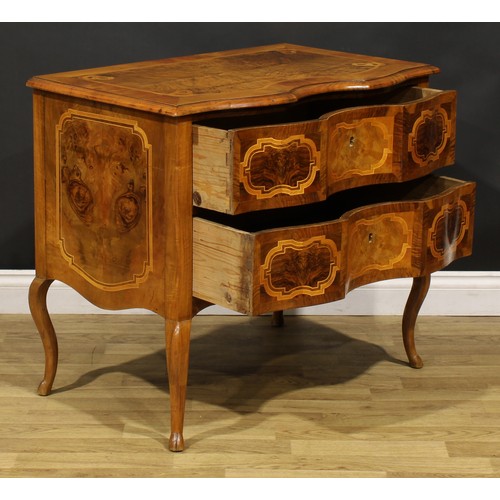 An 18th century style Italian walnut serpentine commode, oversailing ...