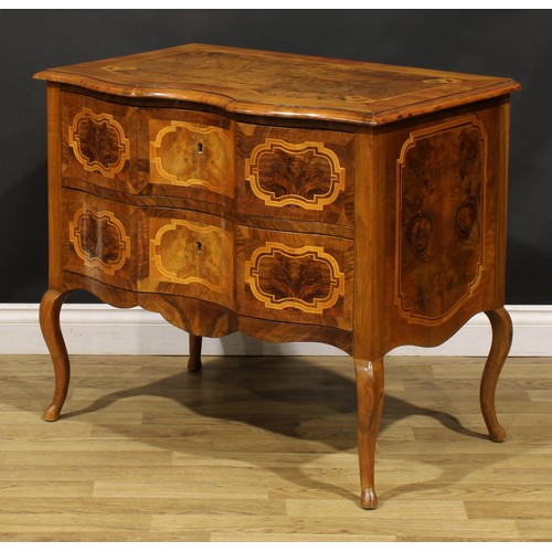 An 18th century style Italian walnut serpentine commode, oversailing ...