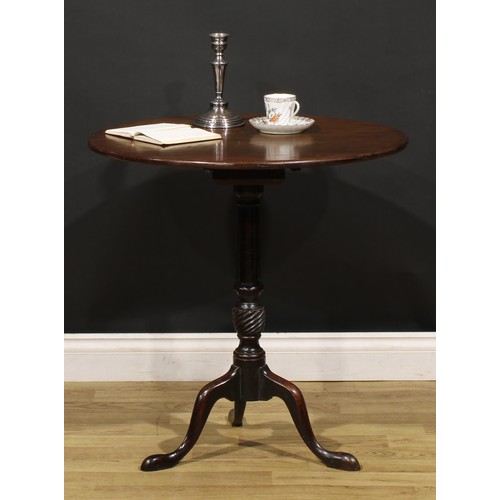 A 19th century mahogany tripod occasional table, one-piece circular ...