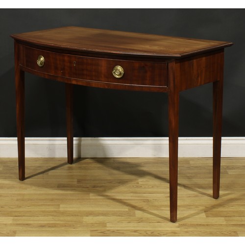 A Regency mahogany bowfront bedroom side table, oversailing top with ...