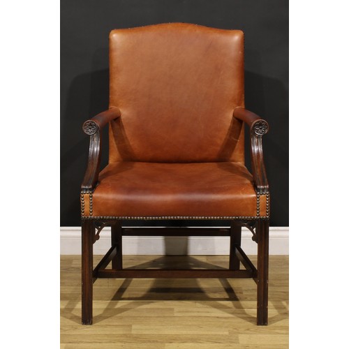 A Chippendale Revival mahogany Gainsborough armchair, stuffed-over ...