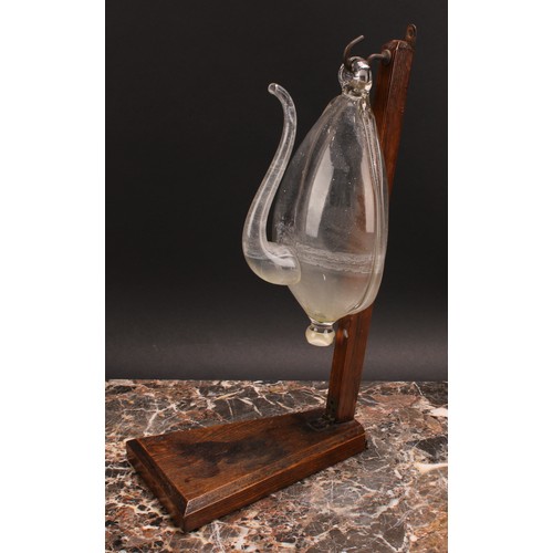 A 19th century Dutch weather glass or donderglas barometer, 23.5cm long ...