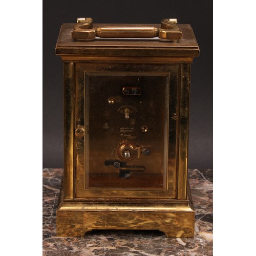 A lacquered brass carriage timepiece, 7cm enamel clock dial inscribed ...