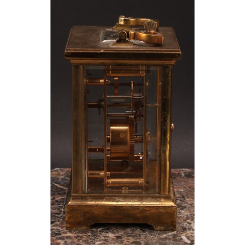 A lacquered brass carriage timepiece, 7cm enamel clock dial inscribed ...