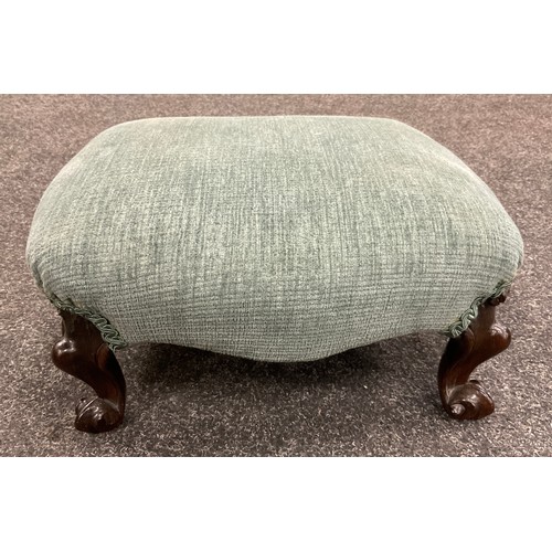 A 19th century footstool, serpentine-shaped top, cabriole legs with ...