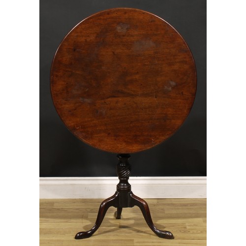 A 19th century mahogany tripod occasional table, one-piece circular ...