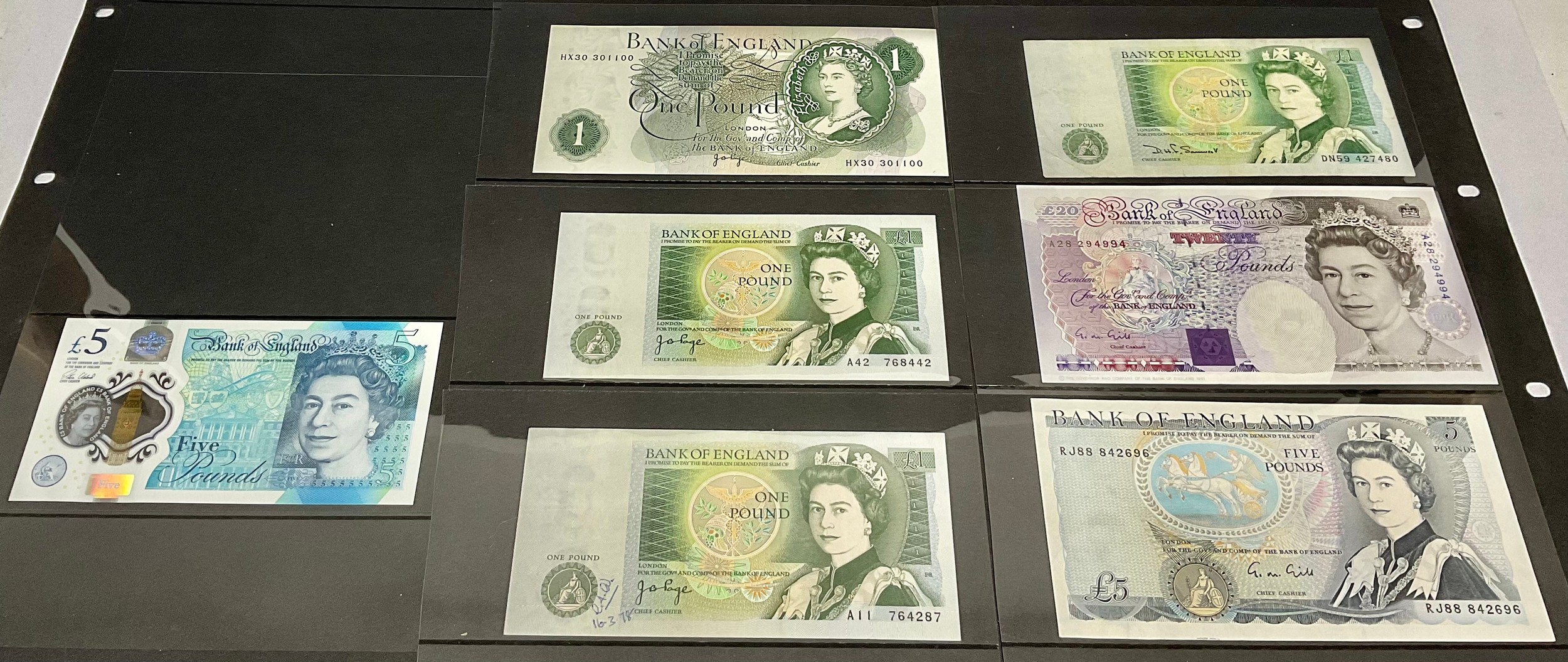 Notaphily – a collection of UK banknotes in three collector’s mounted ...