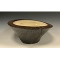 A large treen slope sided bowl candle, 46.5cm diameter