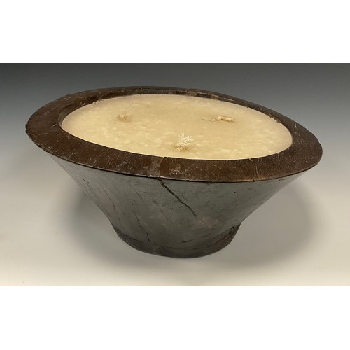 A large treen slope sided bowl candle, 46.5cm diameter
