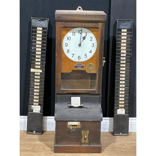 An early to mid-20th century time recorder or clocking-in machine ...