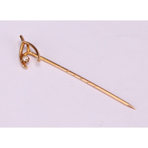 Stick Pins - a 19th century 15ct gold wishbone stick pin, set with a ...