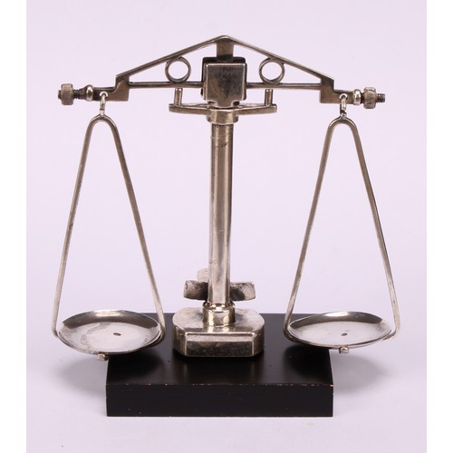 A set of Continental silver toy novelty miniature balance scales ...