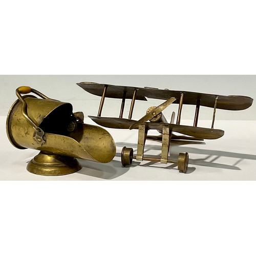A WWI trench art model, of bi-plane, 14cm wide; a trench art coal ...