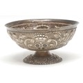 A 19th century Indian silver pedestal bowl, decorated throughout with ...