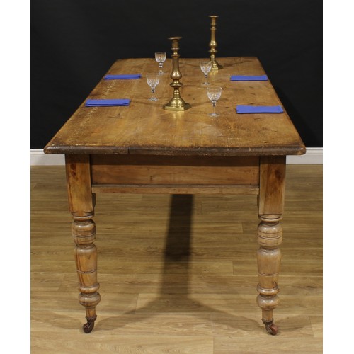 A late Victorian pine servants' quarters or scullery table, rounded ...