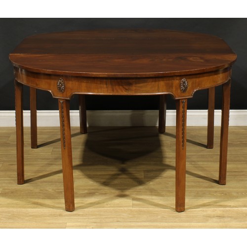 An Adam Revival mahogany D-end dining table, applied with patera and ...