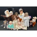 A large Bruj bisque head doll, in period dress, 70cm high, late 20th ...
