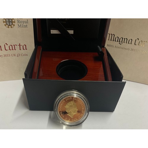 An Elizabeth II Royal Mint gold proof coin, The Magna Carta, 800th ...