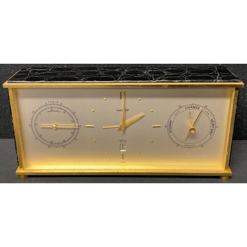 An Asprey's gilt brass Luxor weather station, the central clock with ...