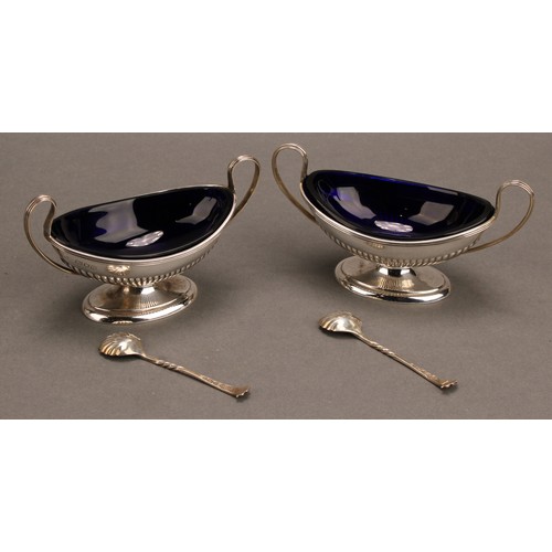 A pair of late Victorian silver twin handled table salts and shell bowl ...