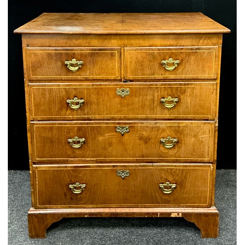 A George II walnut chest, crossbanded oversailing top above two short ...