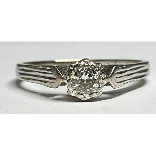 An 18ct white gold diamond solitaire ring, set with an approx. 0.10ct ...