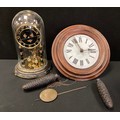 A German postman's alarm clock, white dial, twin weight movement with ...