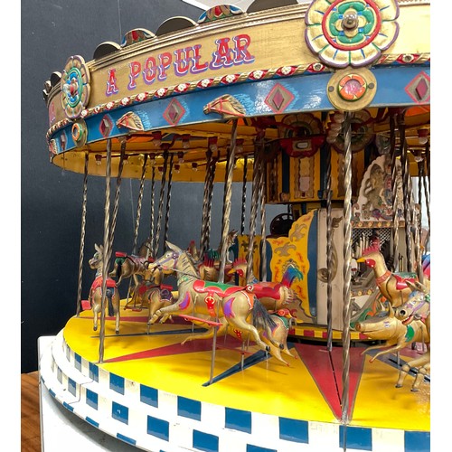 A handmade scratch built model, of a Fairground Carousel, made by Geoff ...