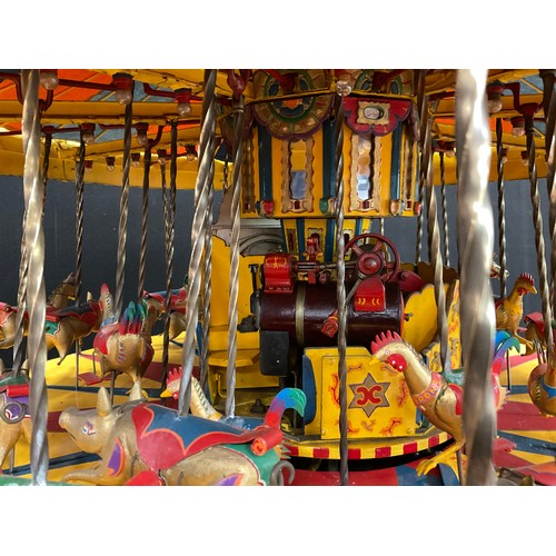 A handmade scratch built model, of a Fairground Carousel, made by Geoff ...