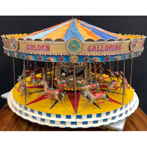 A handmade scratch built model, of a Fairground Carousel, made by Geoff ...
