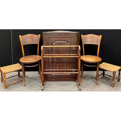 Furniture - An early George III oak corner cupboard, the door with ...