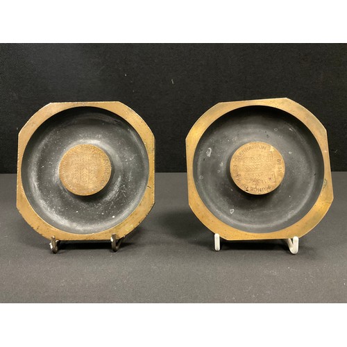 A pair of Prince of Wales investiture bronze ash trays, designed by ...