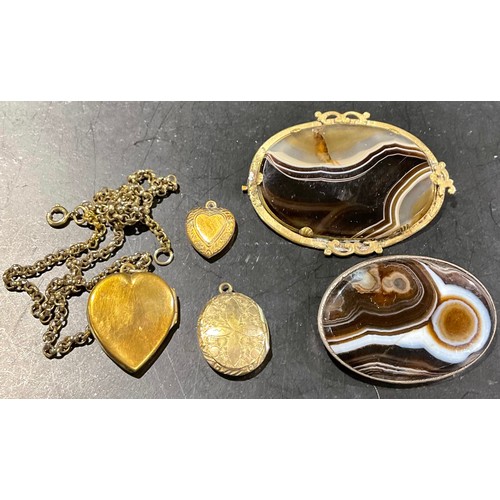 A selection of jewellery, to include a Victorian gold plated oval brown ...