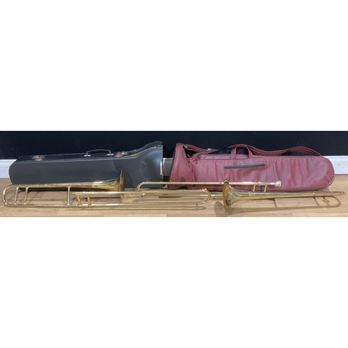 Musical Instruments - a Corton brass trombone, leather Rhino case; a ...