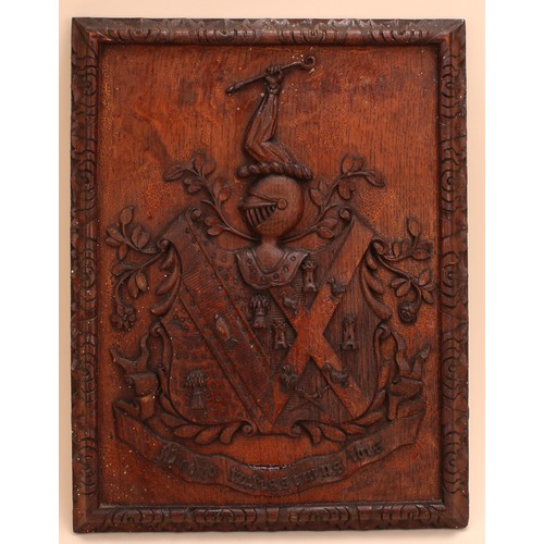 Heraldry - a 19th century oak armorial panel, carved with arms and ...