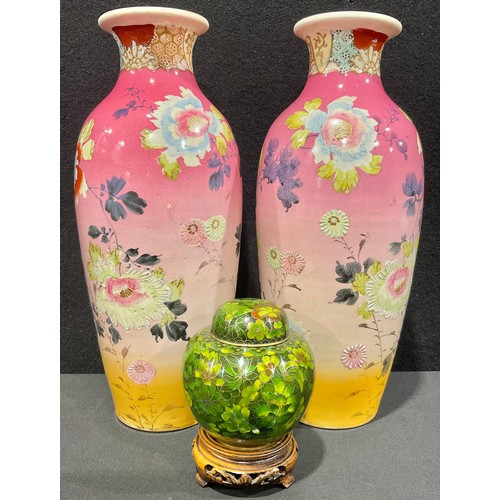 A pair of Japanese slender ovoid vases, each painted with a bird ...