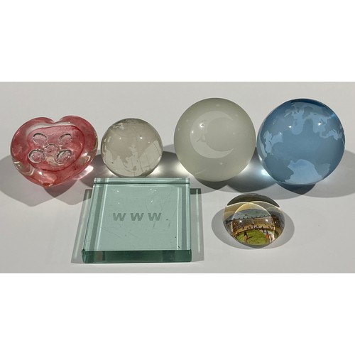 Novelty paperweights; two engraved as terrestrial globes, one with moon ...