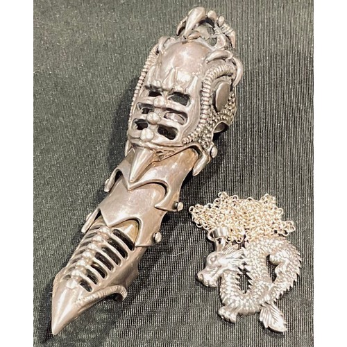 A tested silver gothic full finger armour ring, size Z and a tested ...