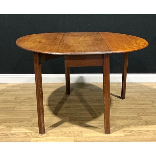 A George III Revival mahogany gateleg table, moulded internally ...