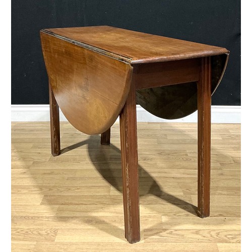 A George III Revival mahogany gateleg table, moulded internally ...