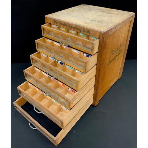 A Perivale Sewing Silk threads six drawer counter top chest, top five ...