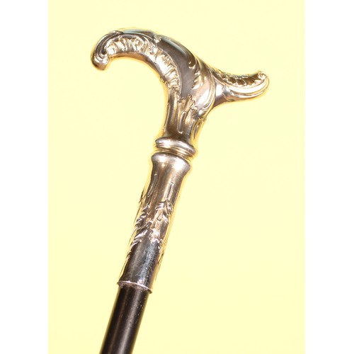 A French parcel-gilt silver mounted walking stick, the Rococo handle ...